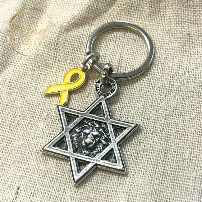 Star of David keychain with a yellow ribbon. - אלעד יציקות ~ יצרן כחול לבן